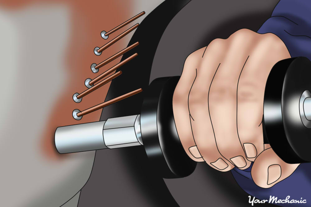 How to Fix a Dent with a Stud Welder Gun | YourMechanic Advice