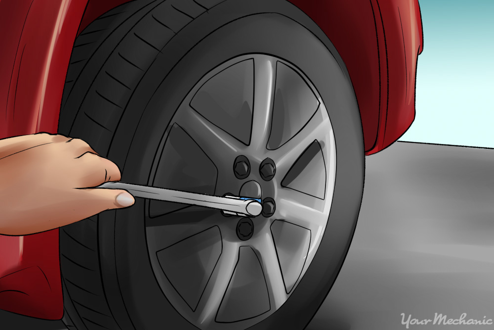 How to Change a Tire | YourMechanic Advice