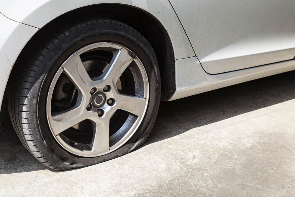 Is it Safe to Drive With a Flat Tire? | YourMechanic Advice